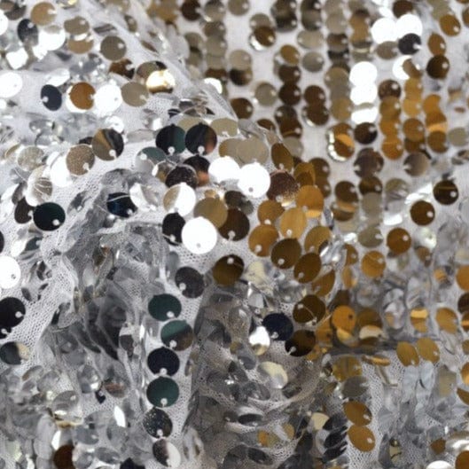 Silver paljettyg – stora 8 mm paljetter & envägsstretch | Tyger ...